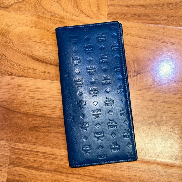 MCM | Bags | Authentic Mcm Long Fold Imprinted Leather Wallet | Poshmark